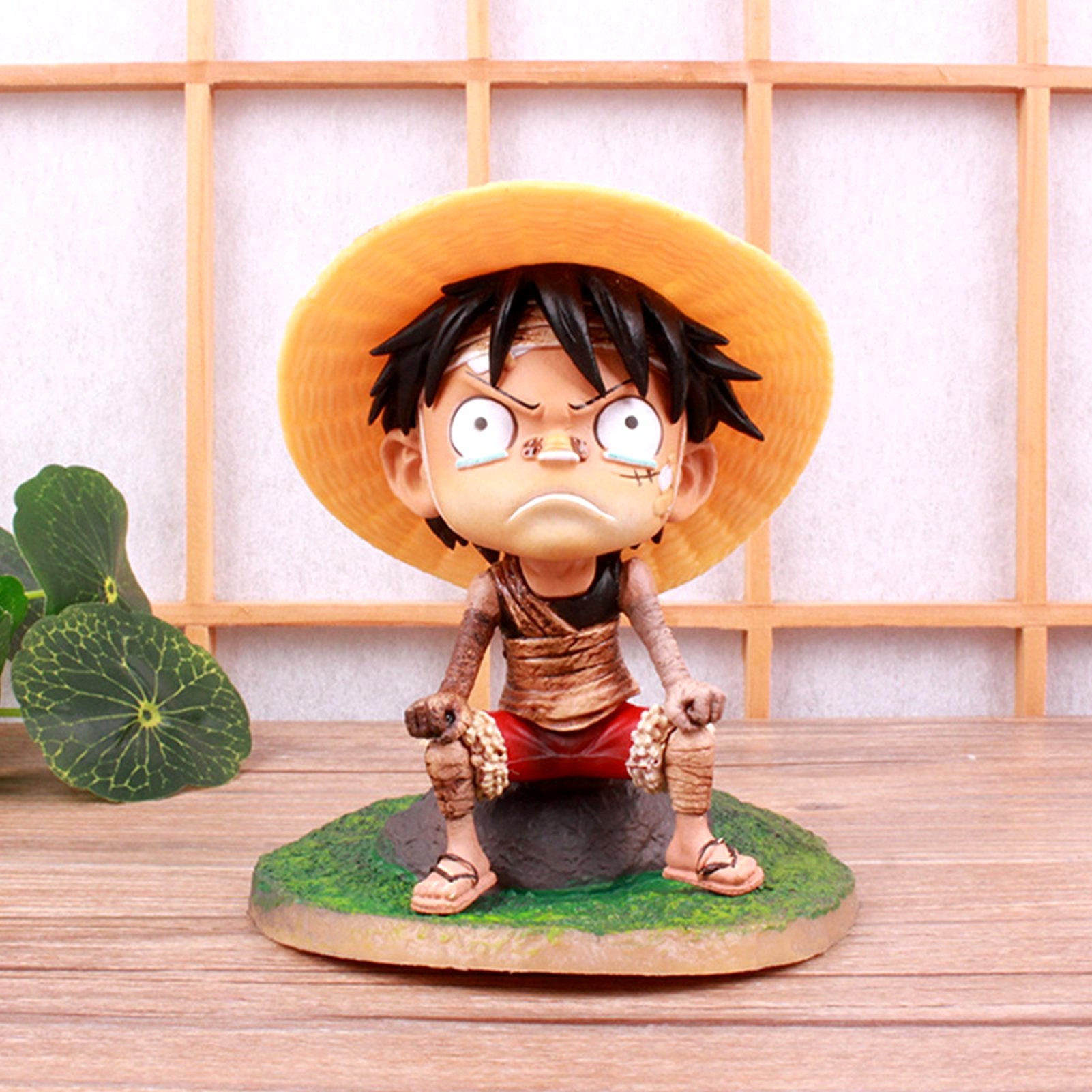 One Piece Straw Hat Kid Luffy Sitting Bandaged Action Figure (12 Cms)